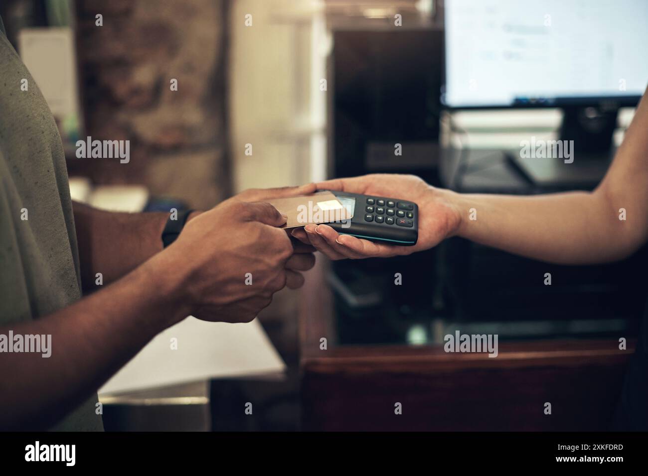 Business, hands and credit card on machine at POS with electronic ...