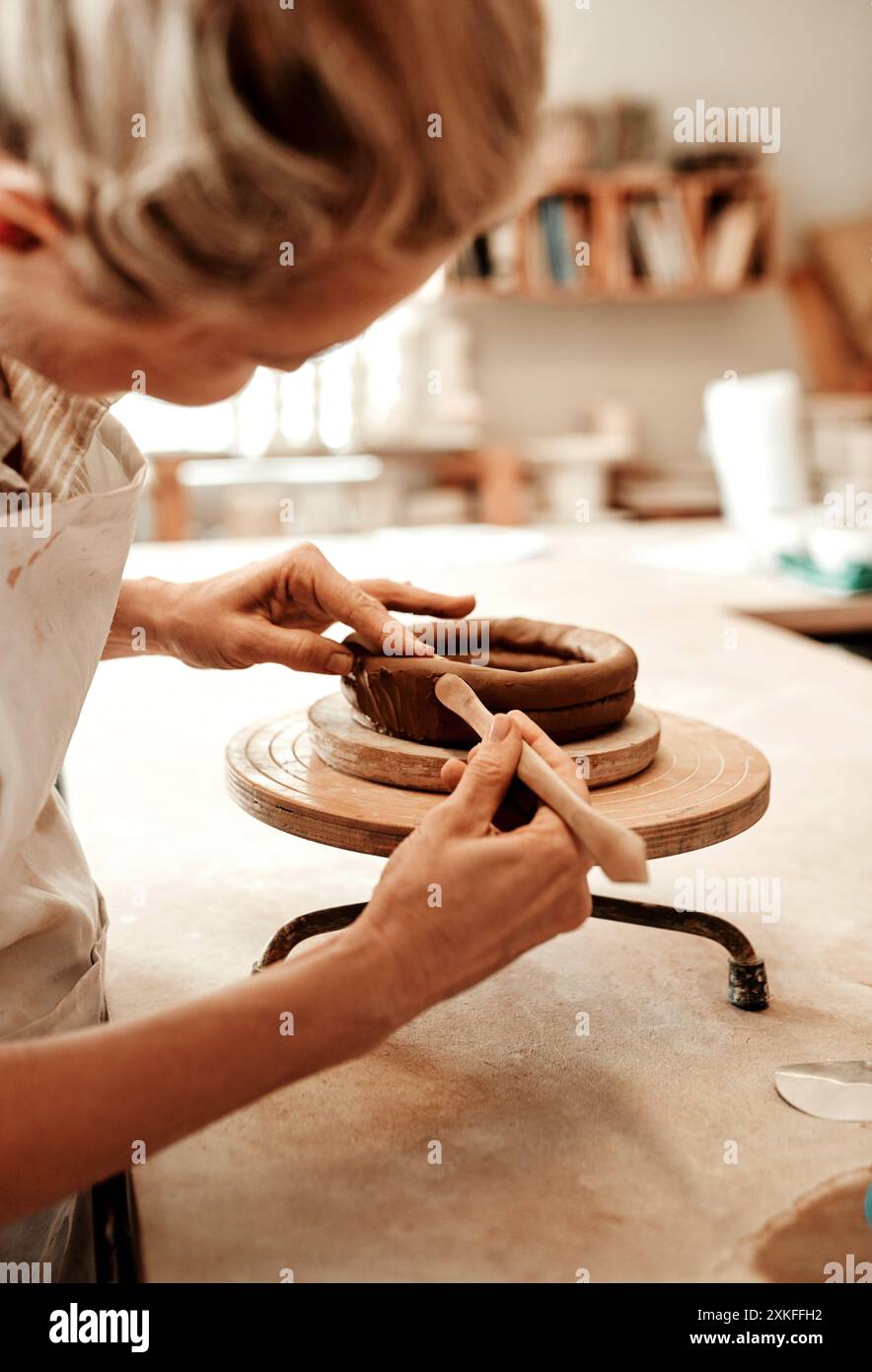Artist, mold and pottery sculpting in studio for ceramics, shape and ...