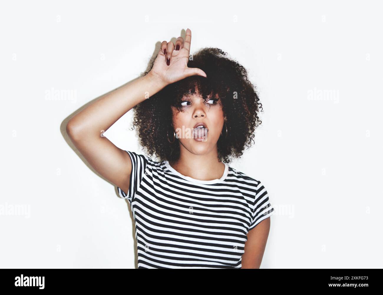 Teenager, girl and loser hand sign with wow, gen z gesture and surprise ...
