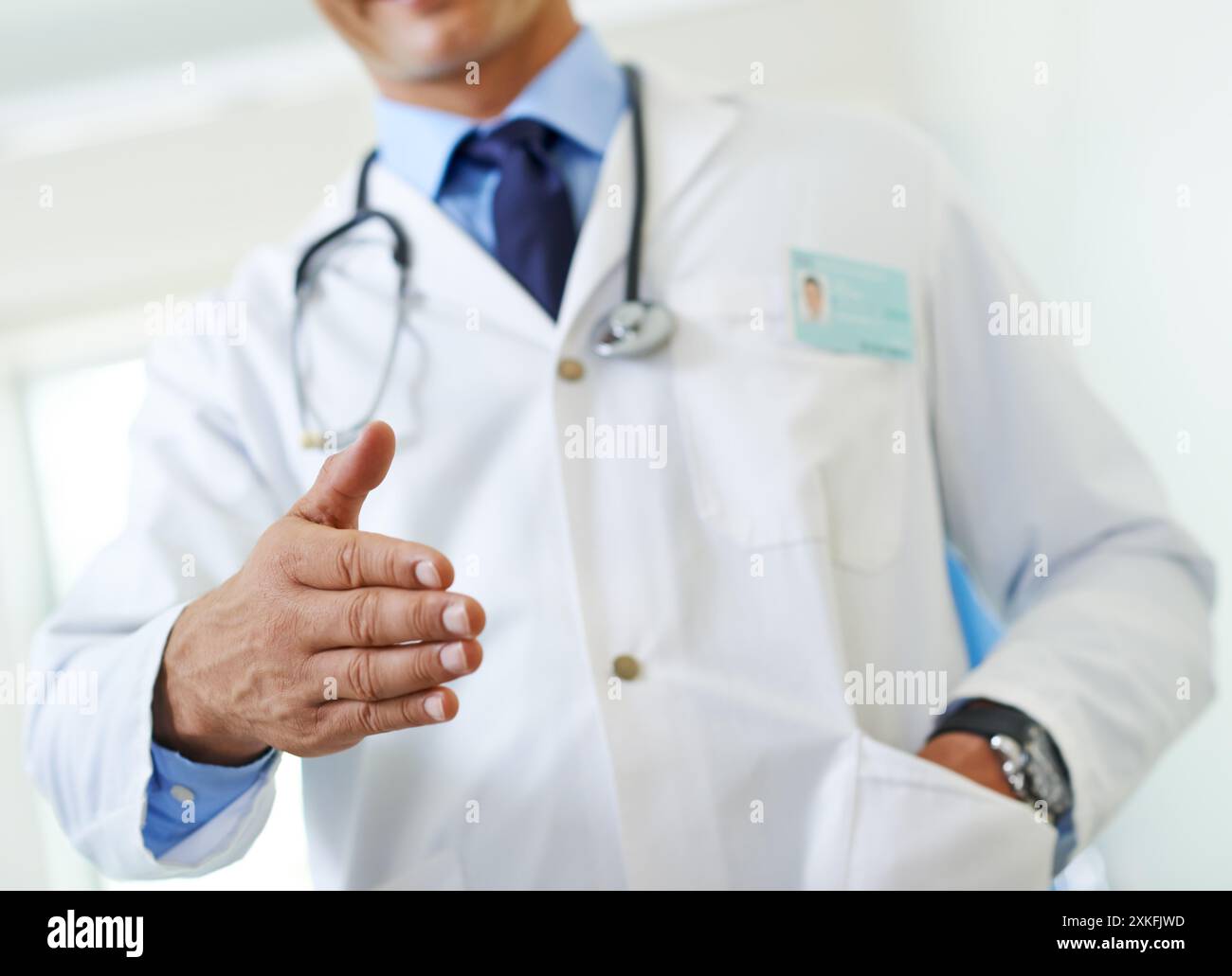Doctor, handshake and greeting gesture in hospital, man and welcome ...
