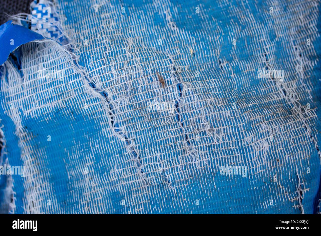 Damaged tarpaulin hi-res stock photography and images - Alamy