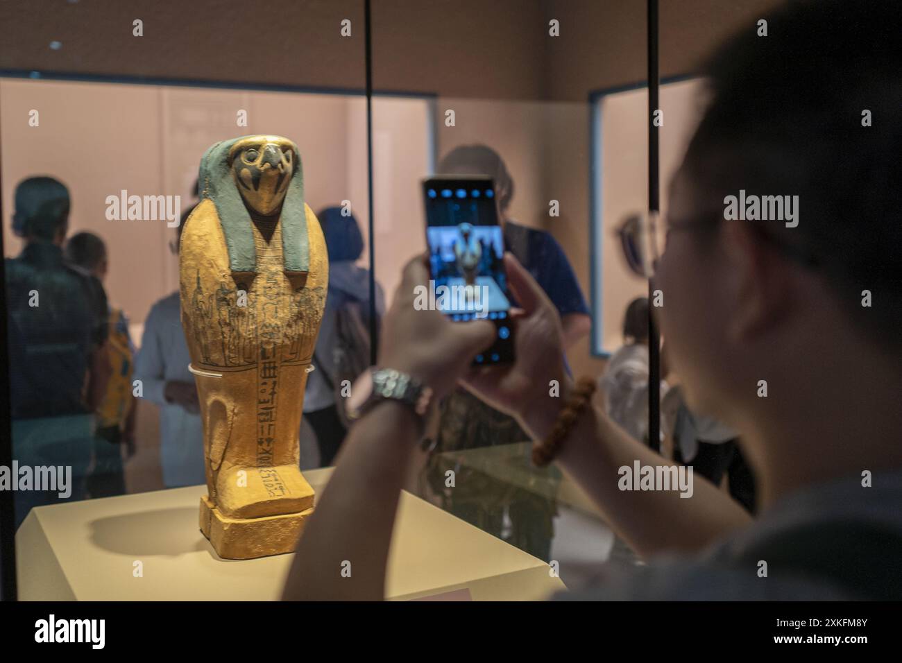 People visit the grand exhibition "On Top of the Pyramid: The ...