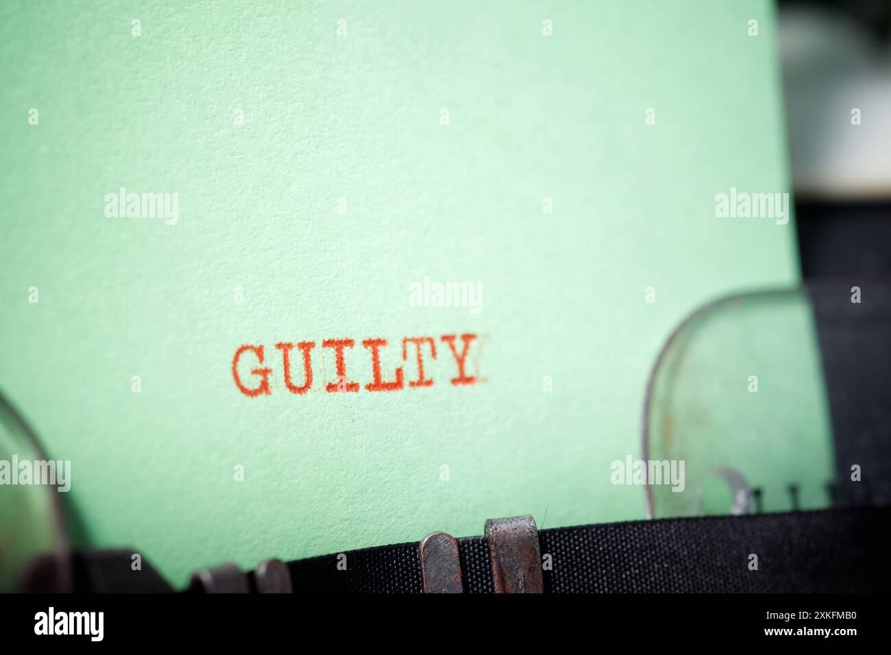 Guilty word written with a typewriter Stock Photo - Alamy