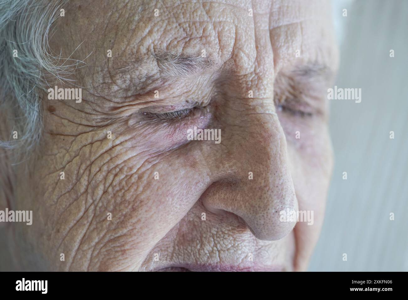 closeup wrinkled face of a senior person crying Stock Photo - Alamy