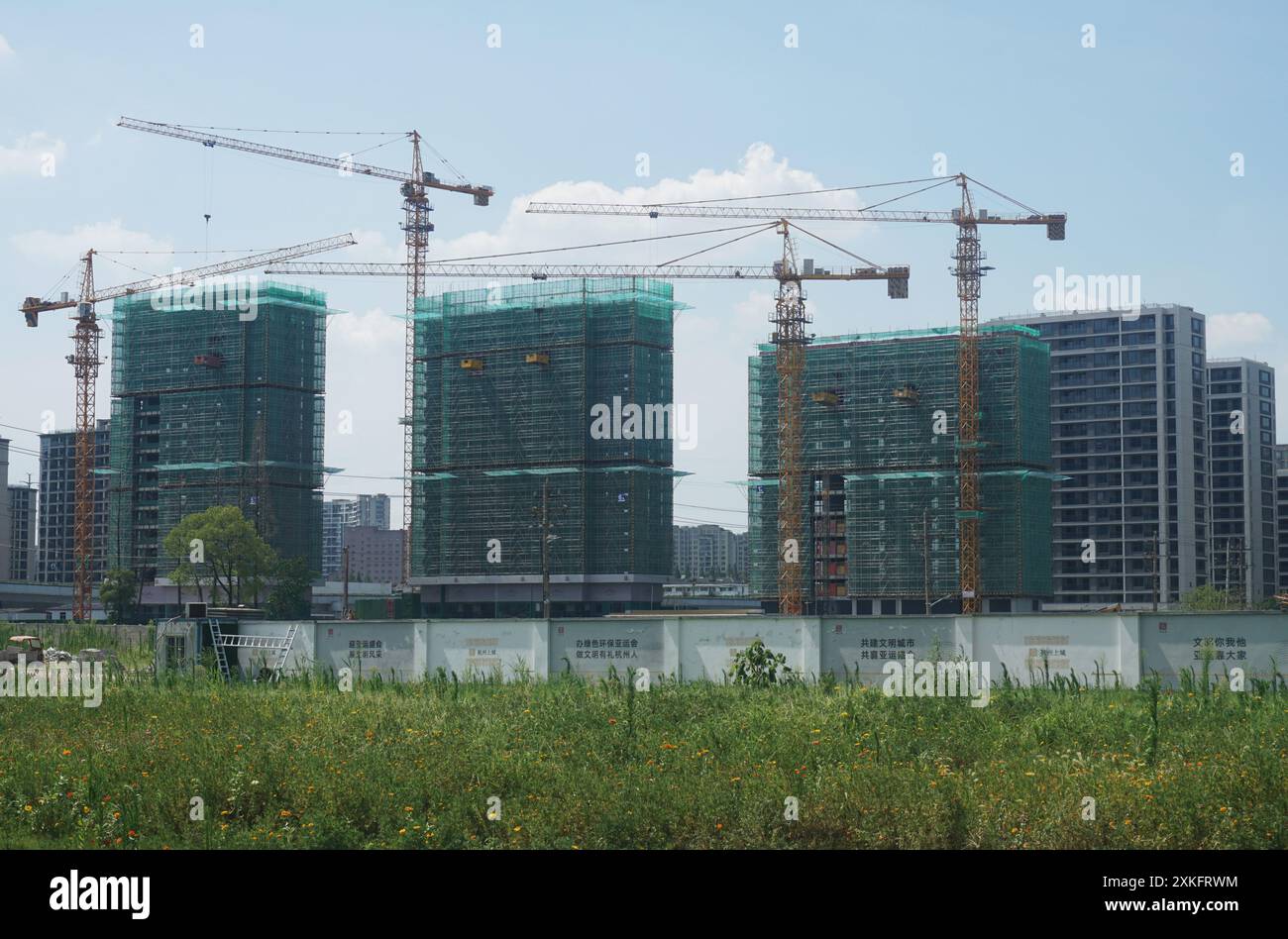 HANGZHOU, CHINA - JULY 23, 2024 - A building under construction and ...