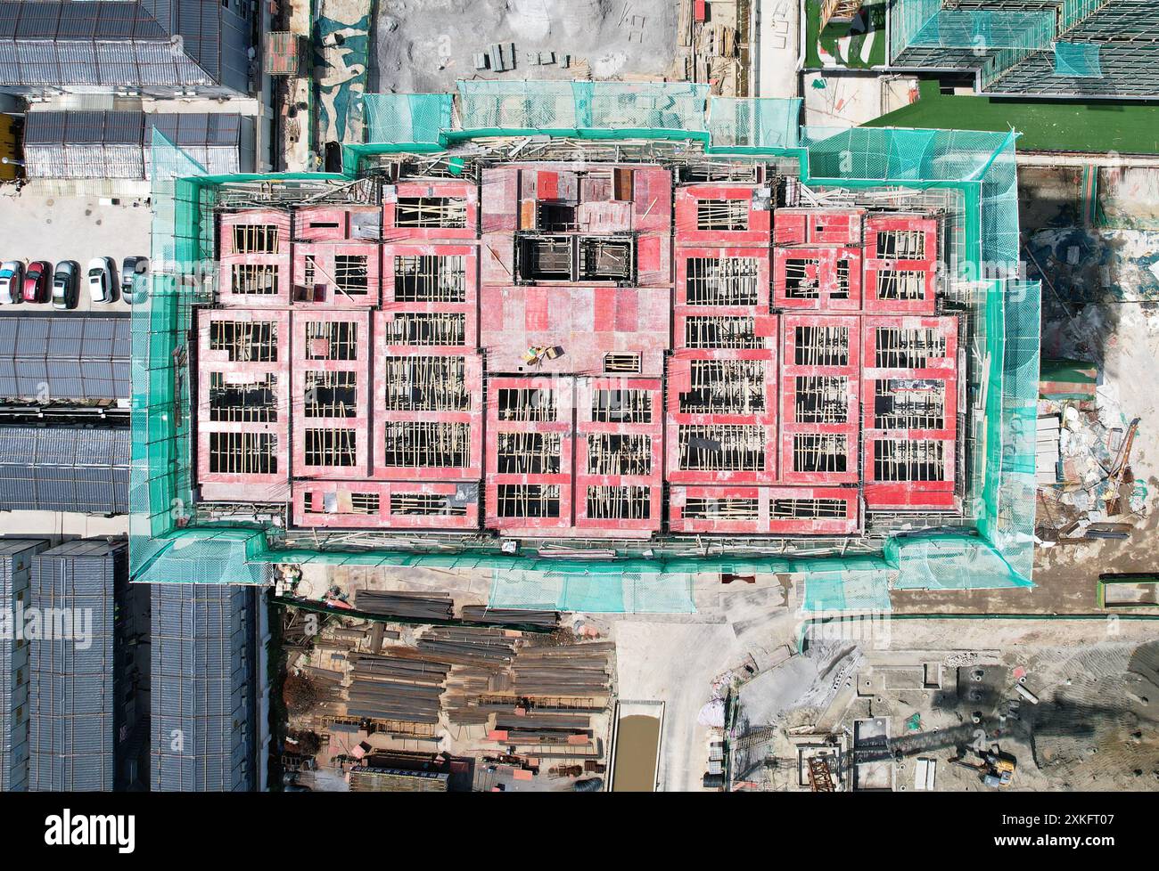 HANGZHOU, CHINA - JULY 23, 2024 - A building under construction and ...