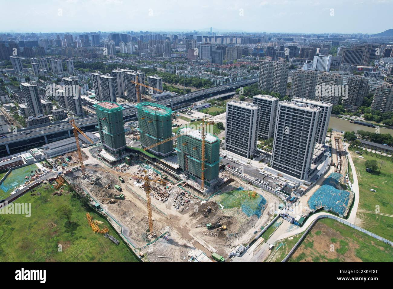 HANGZHOU, CHINA - JULY 23, 2024 - A building under construction and ...