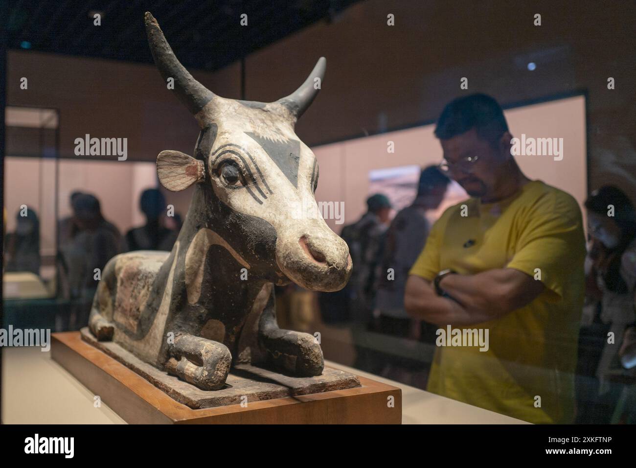 People visit the grand exhibition "On Top of the Pyramid: The ...