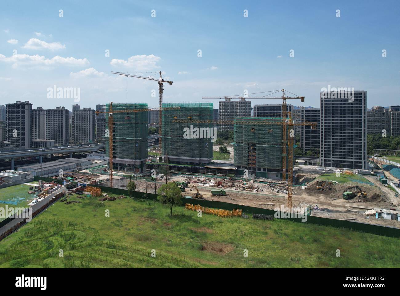 HANGZHOU, CHINA - JULY 23, 2024 - A building under construction and ...