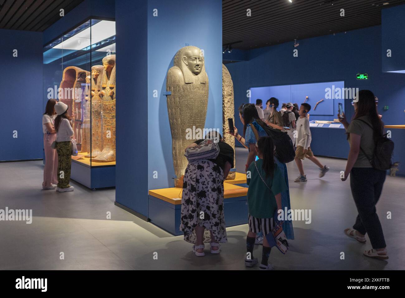 People visit the grand exhibition "On Top of the Pyramid: The ...