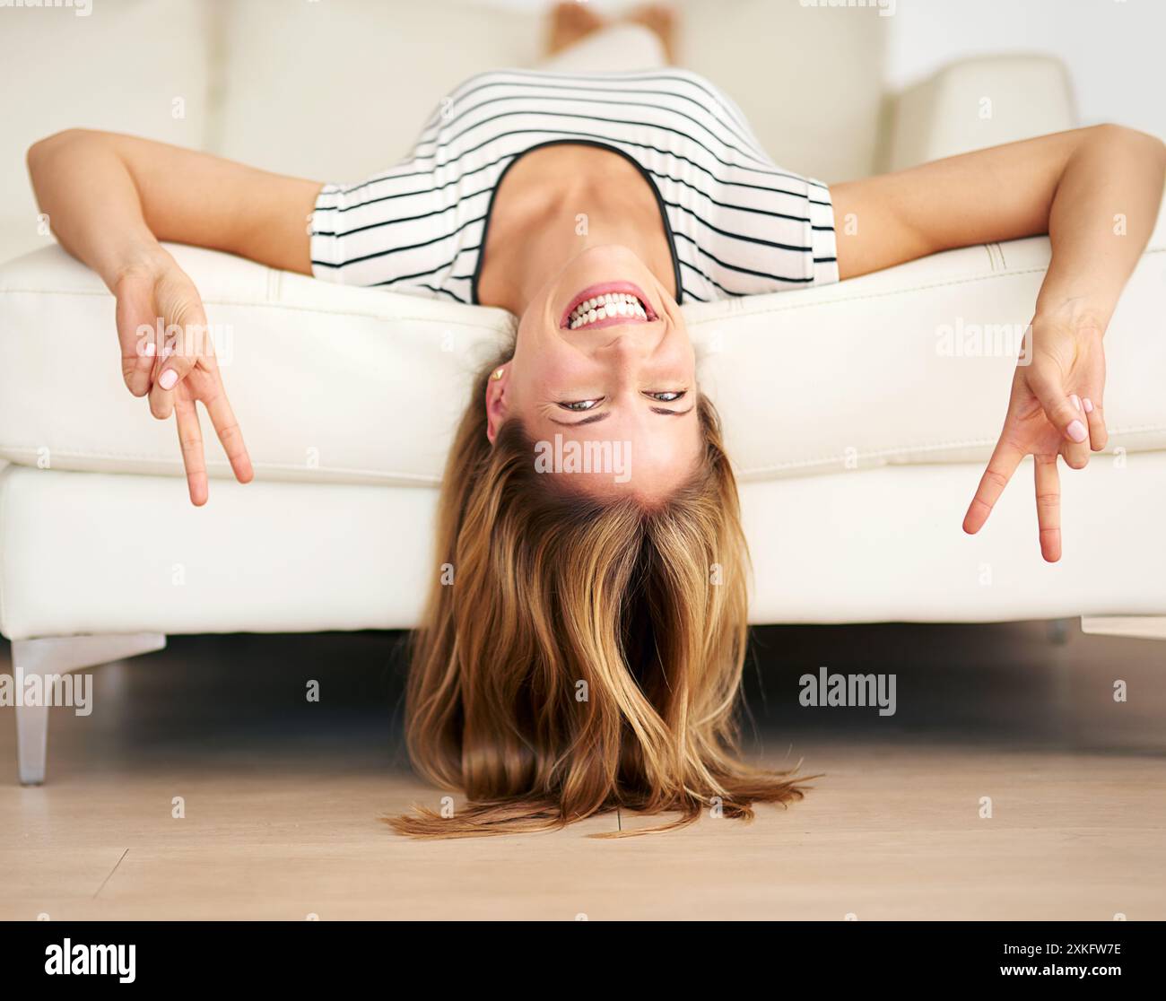 Hand peace sign upside down hi-res stock photography and images - Alamy
