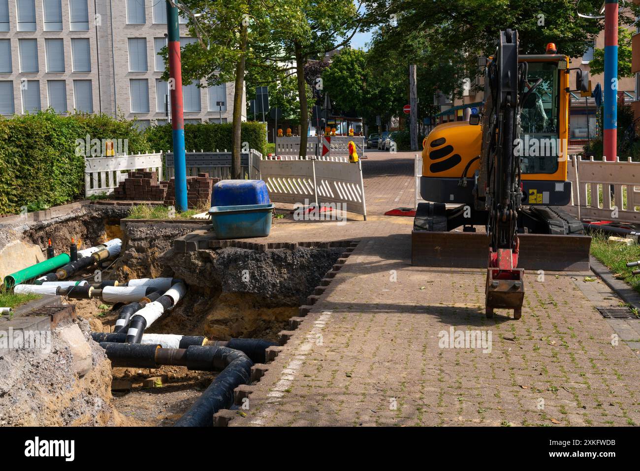 The process of installation and maintenance of urban pipelines. Large ...