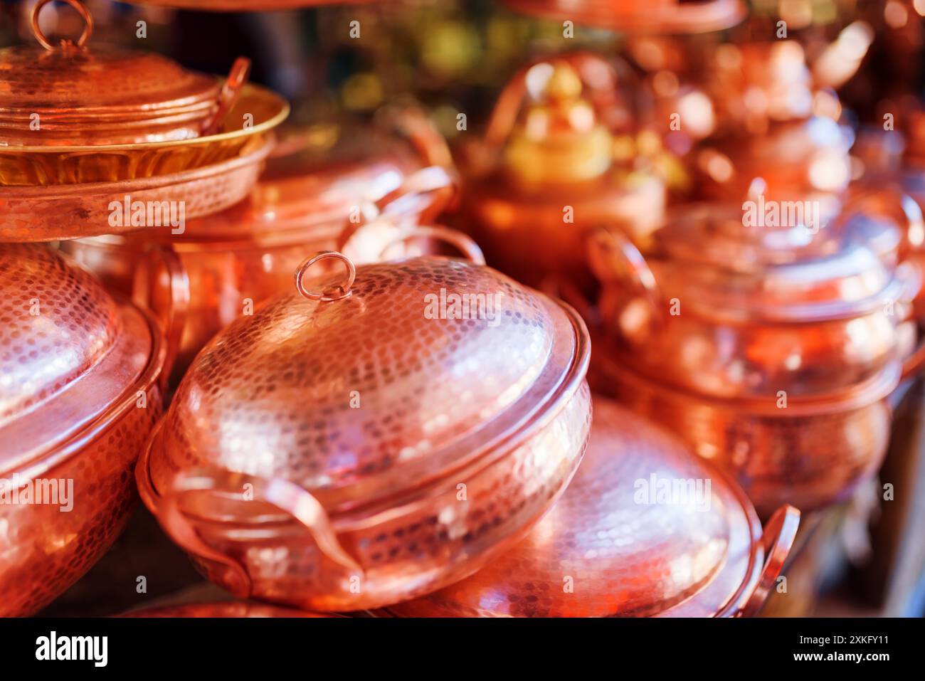 Traditional Chinese handmade copper utensils at market, Lijiang Stock ...