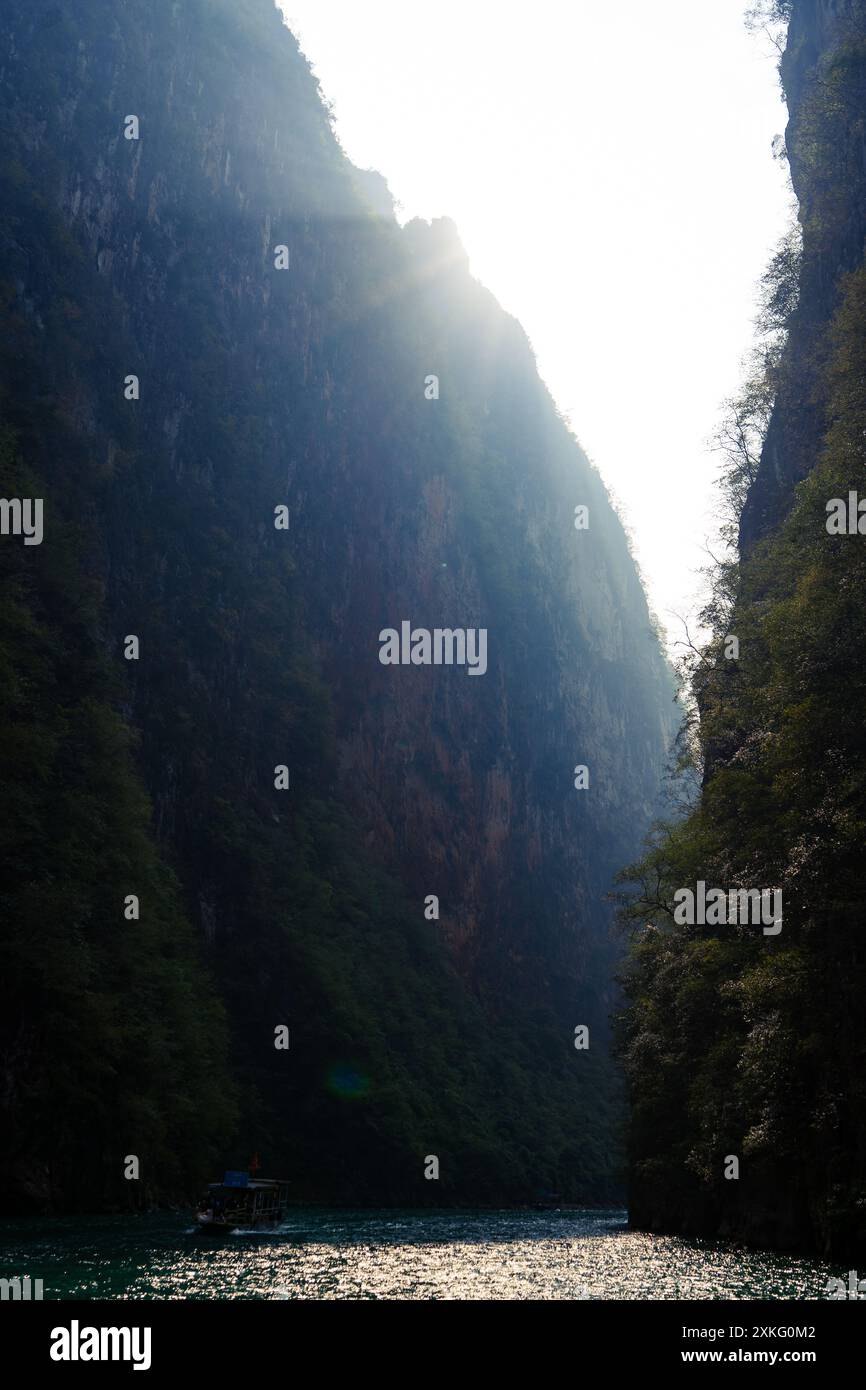 Boat trip in between two cliffs Stock Photo - Alamy