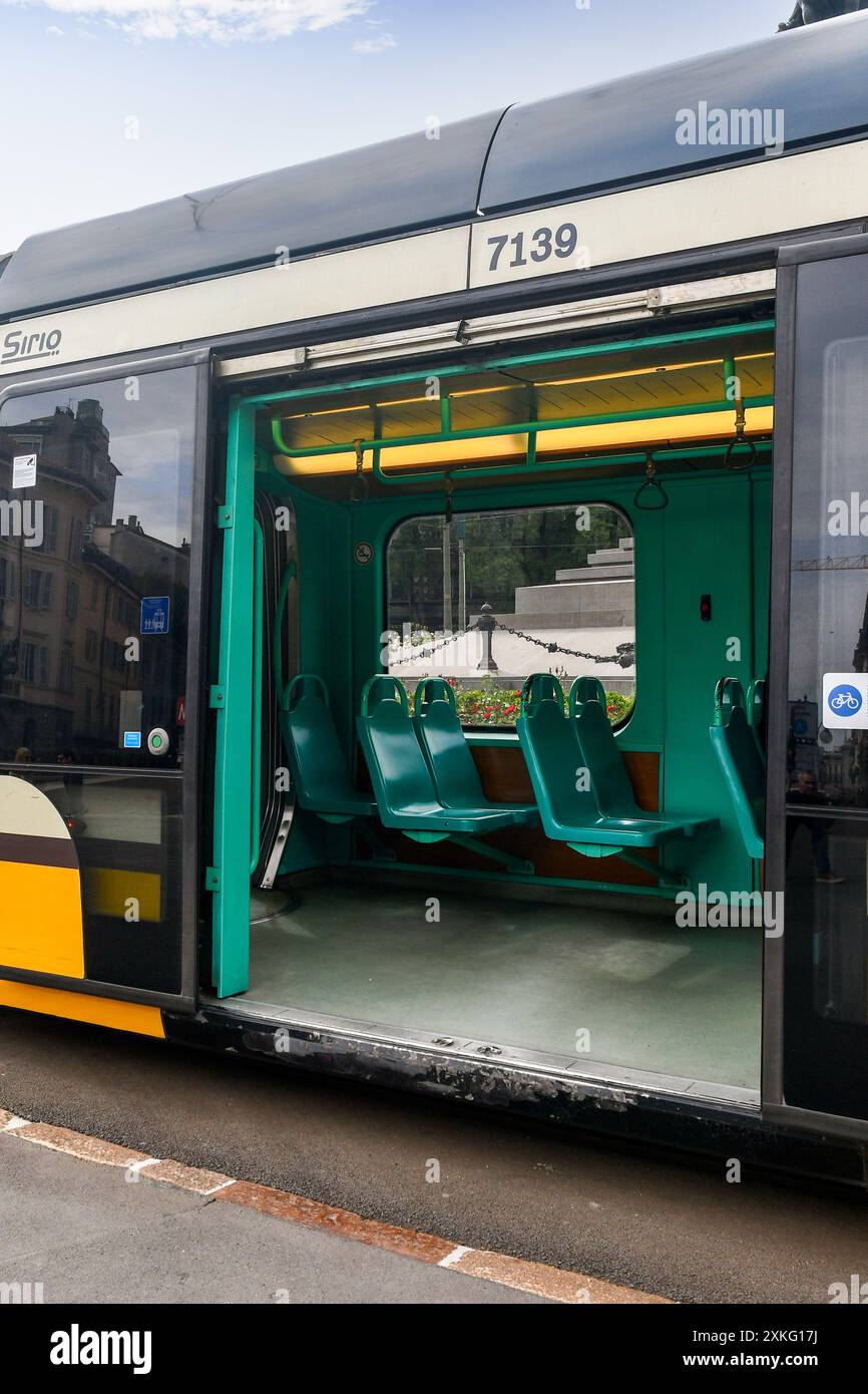 Tram with open doors at a stop in the city centre, without passengers ...