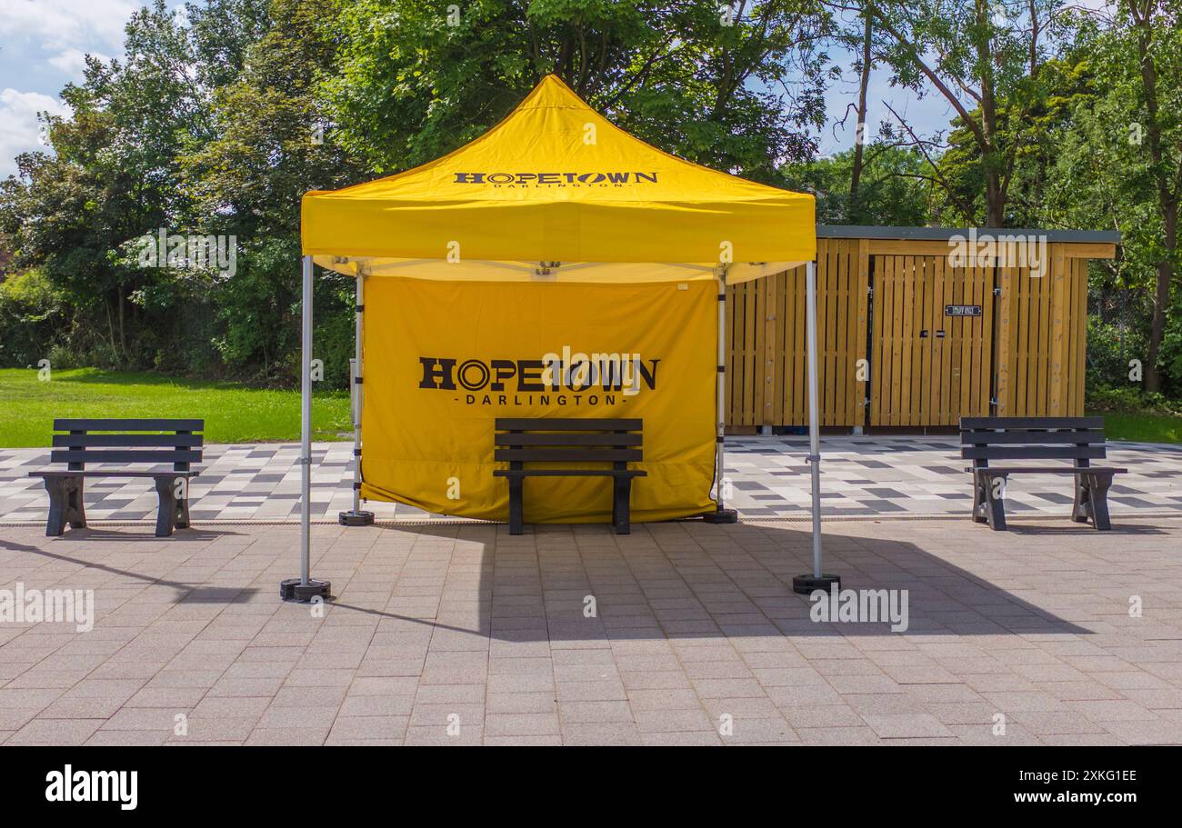 A yellow gazebo with the signage etc of the Hopetown Darlington Railway ...