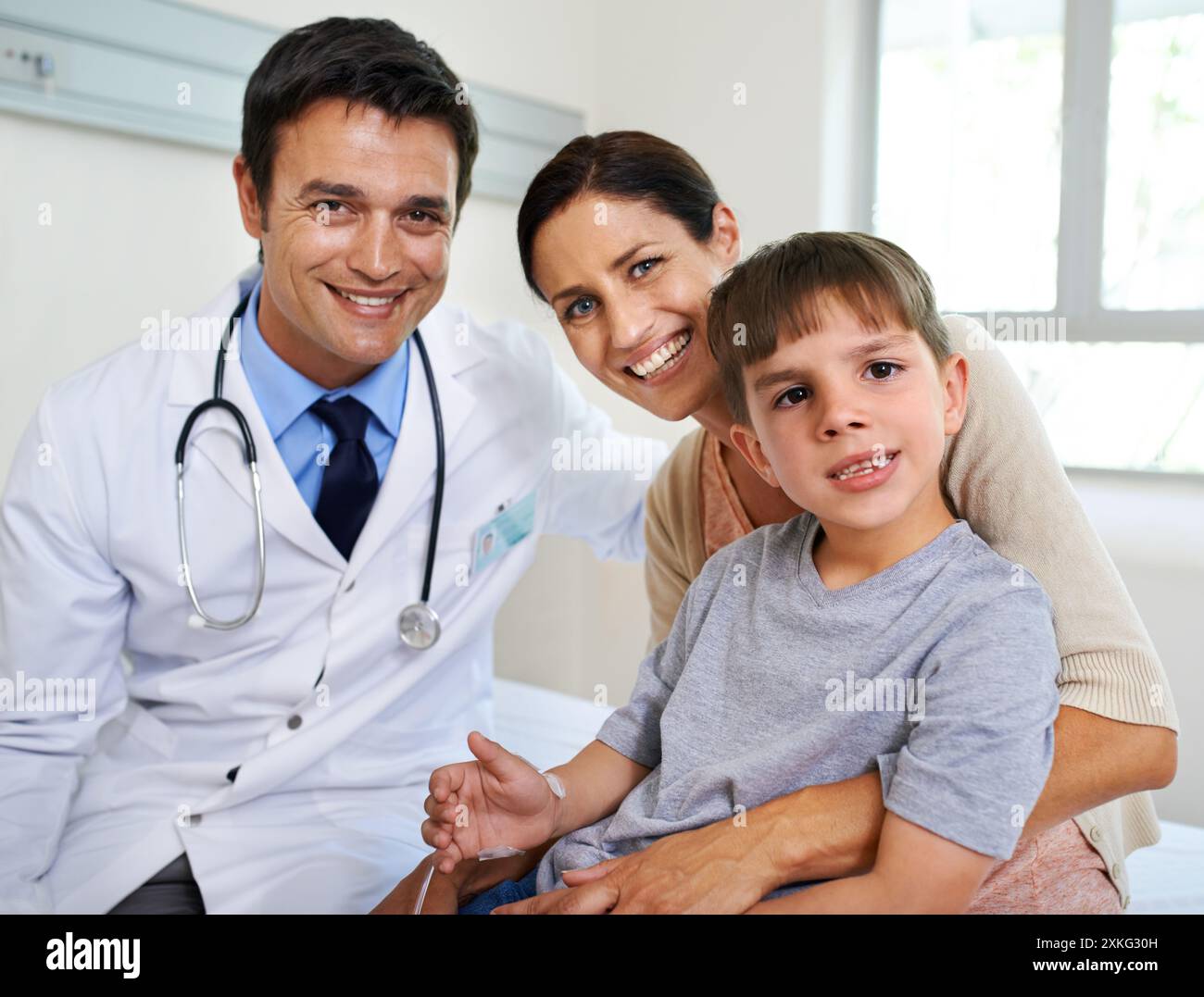 Portrait, mother and child with doctor for checkup of consulting ...