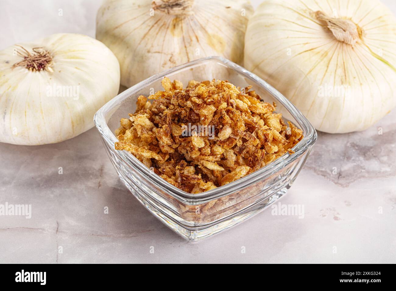 Dried roasted onion crunchy flakes for culinary Stock Photo - Alamy