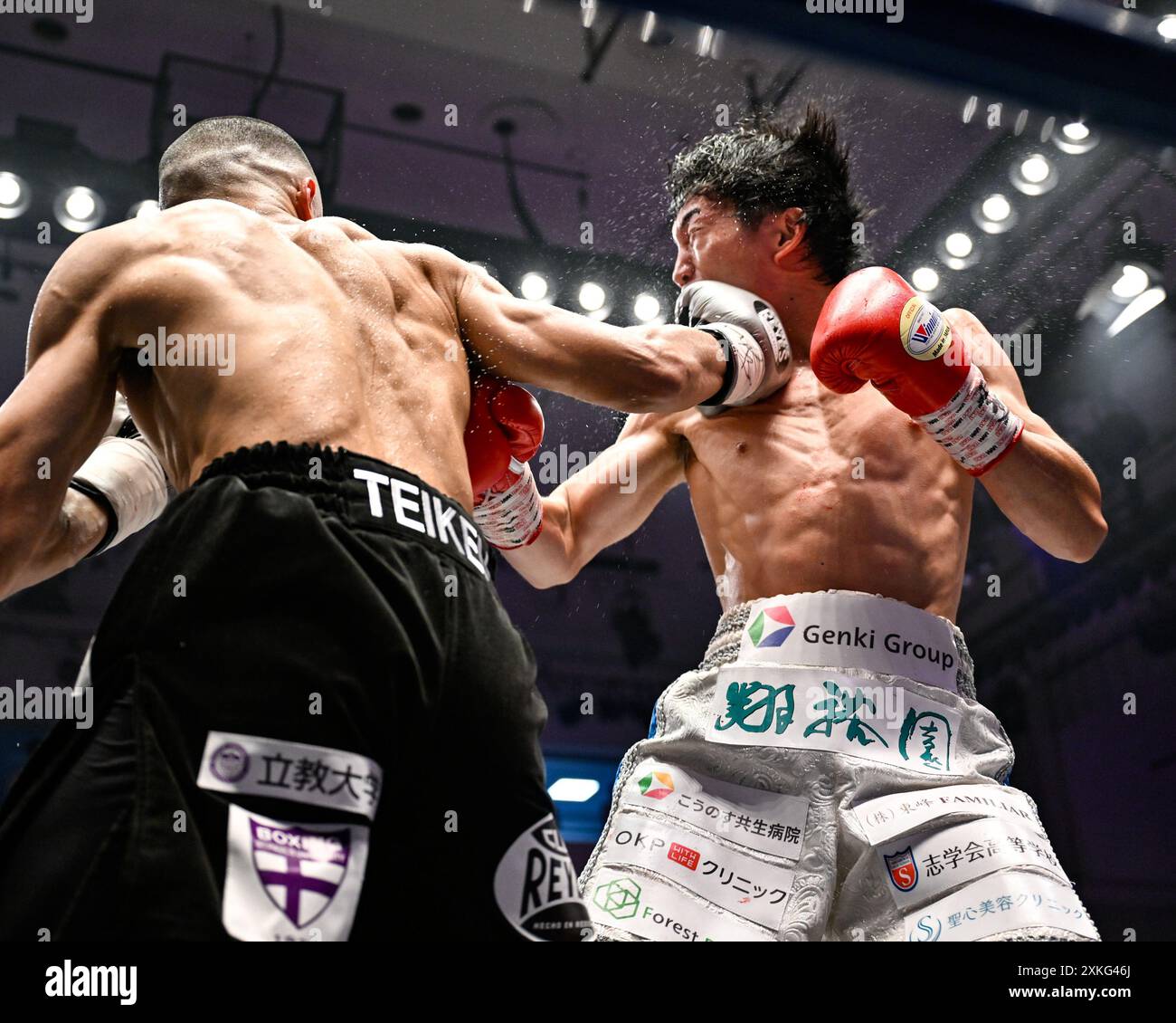 Tokyo, Japan. 18th July, 2024. Riku Masuda (silver gloves) hits Fumiya Fuse (red gloves) in the ...