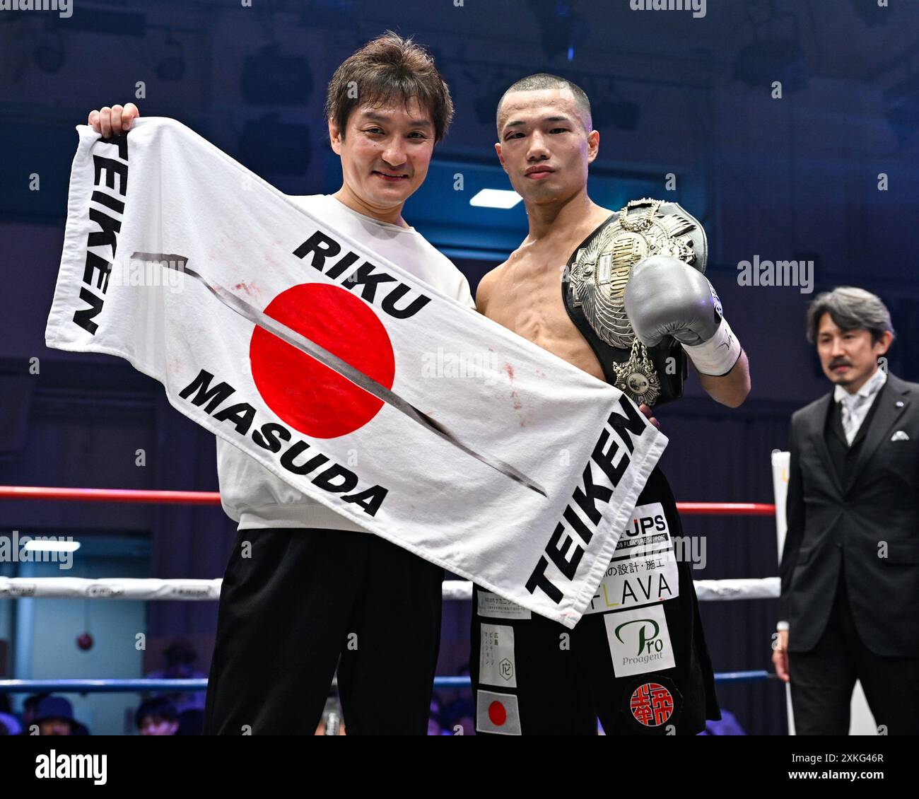 Tokyo, Japan. 18th July, 2024. Riku Masuda, right, poses with trainer Shin Yamato after winning ...