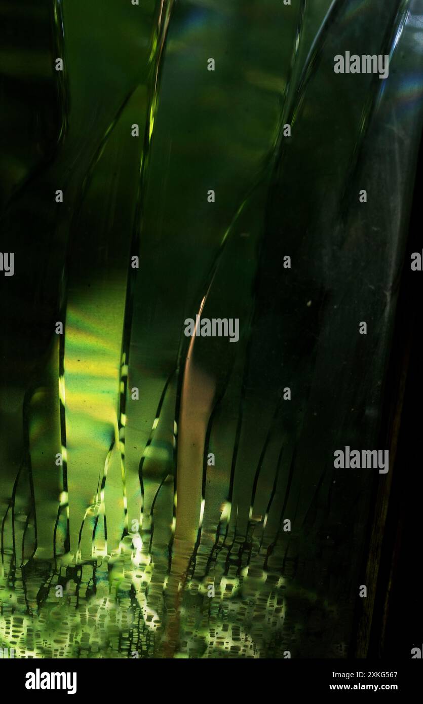 Texture highlights through thick green glass. Light through stained ...