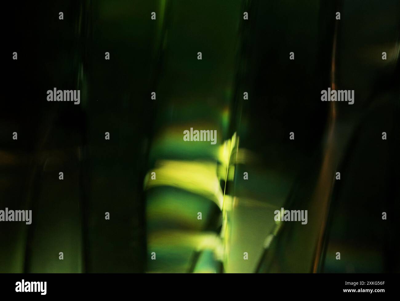 Texture highlights through thick green glass. Light through stained ...