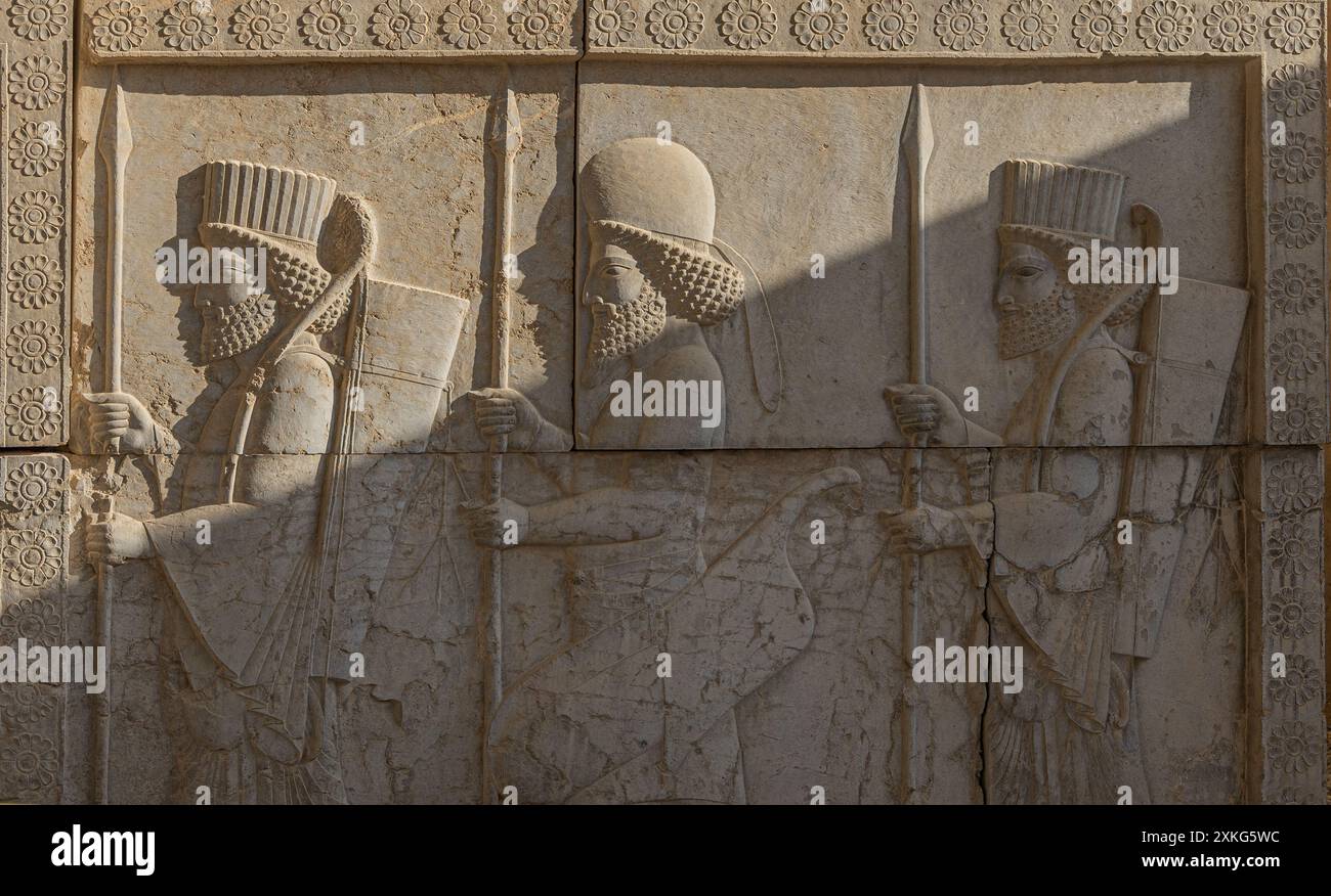 Bas-relief carvings of embossed soldiers in Persepolis, the ancient ...