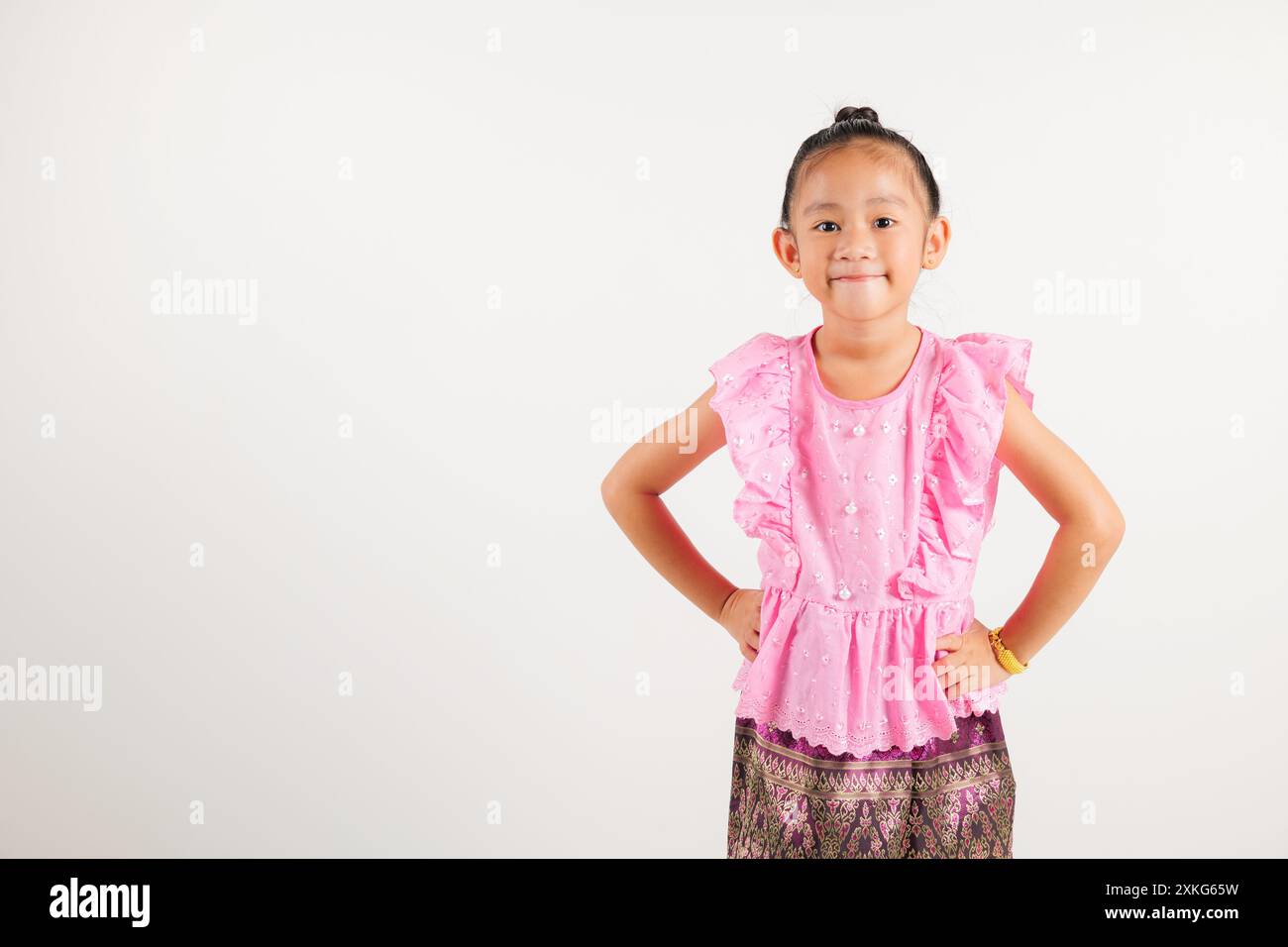 Portrait of Thailand kid girl smiling traditional Thai dress costume ...