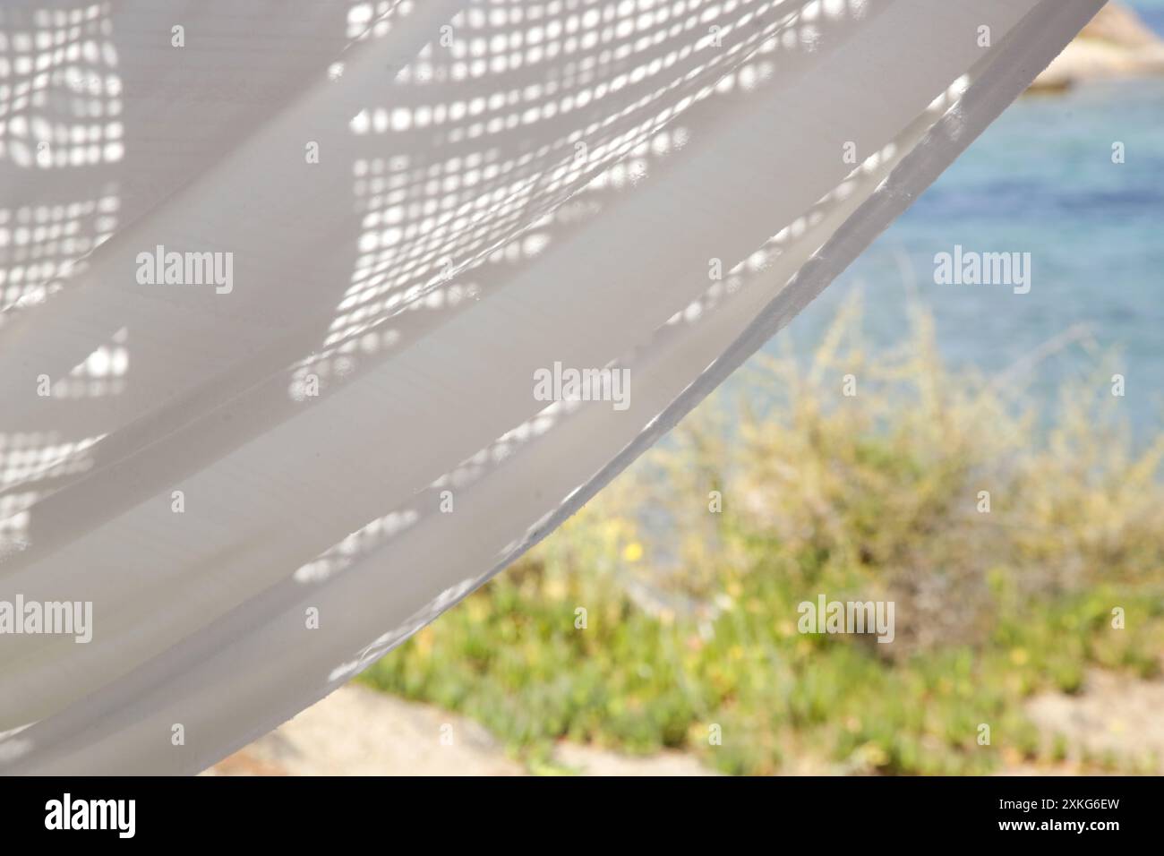Lights and shadows on the linen curtain Stock Photo - Alamy
