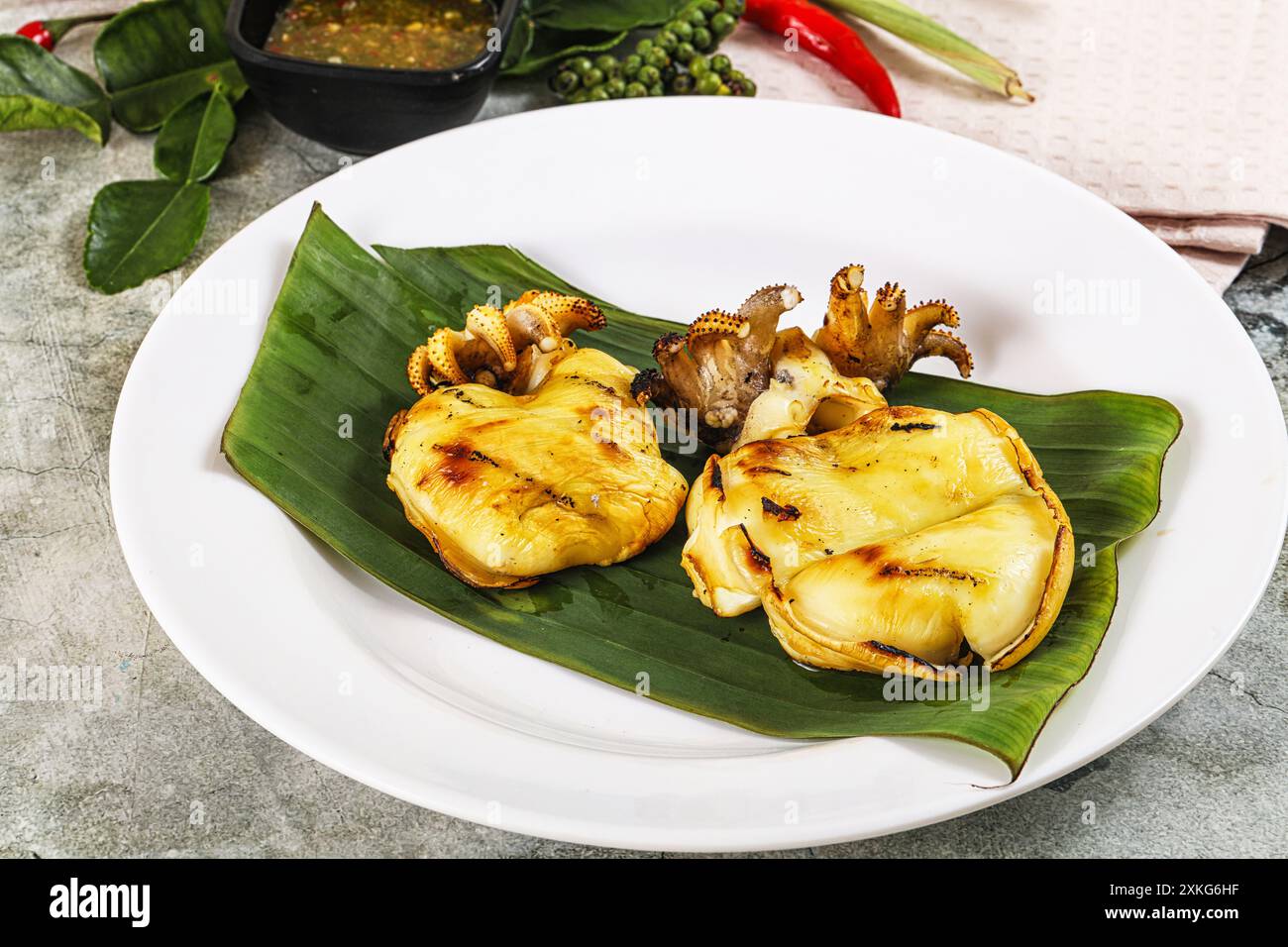 Delicous Grilled cuttlefish with sauce asian style Stock Photo - Alamy