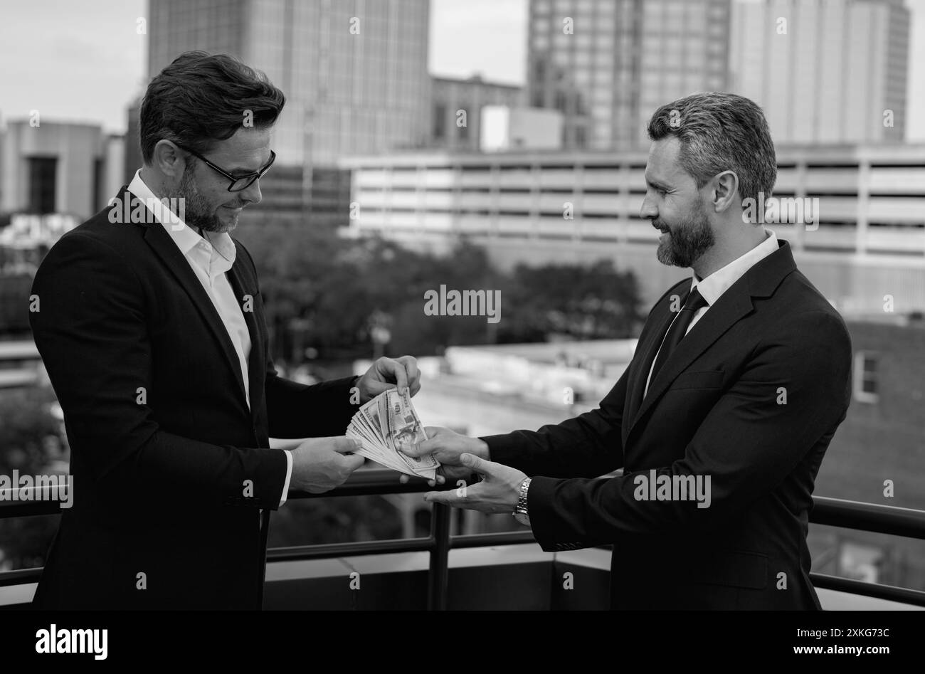 Illegal corruption, bribery concept. Two business team men. Businessmen ...
