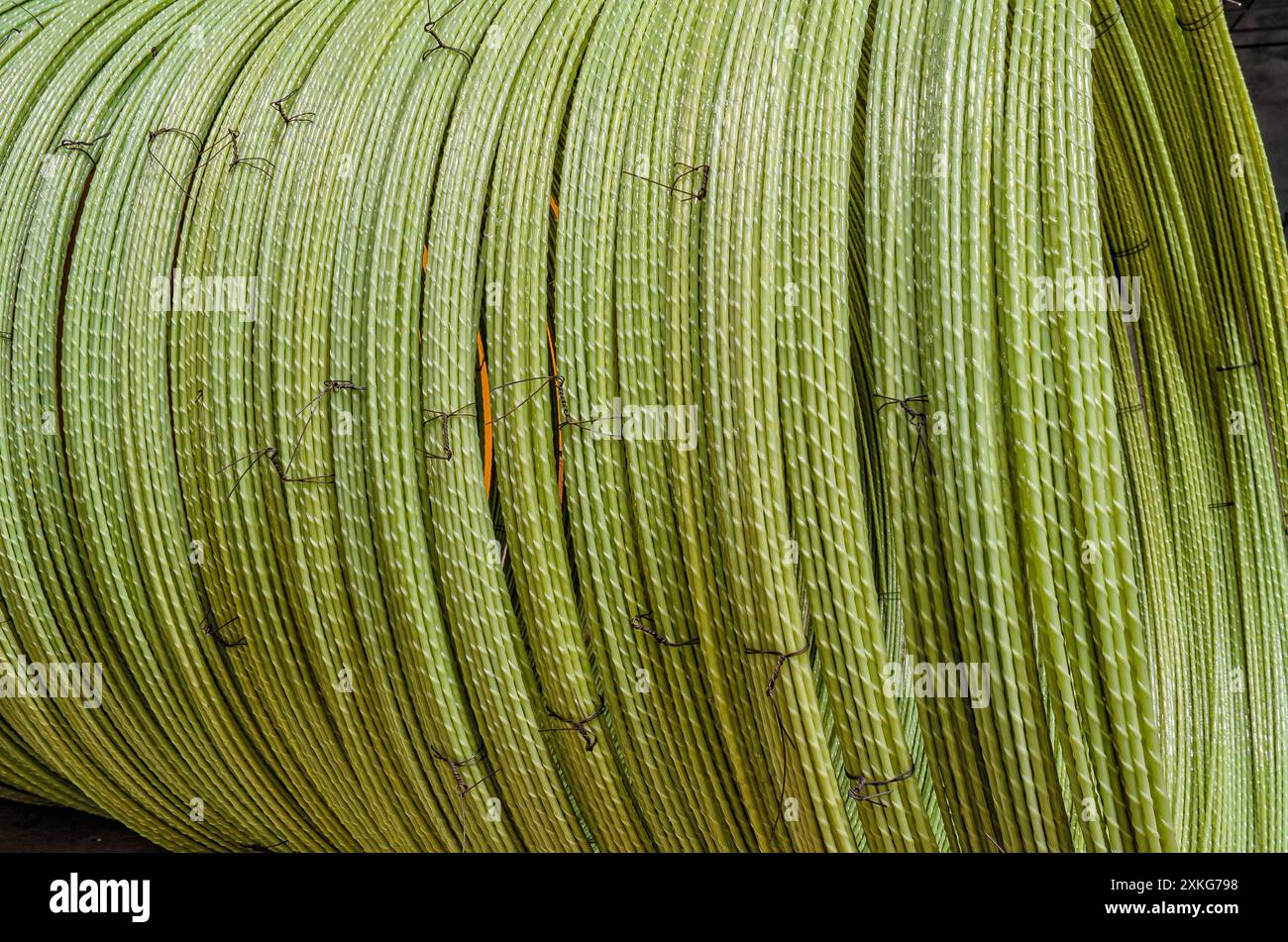 Macro photo of plastic wires twisted into rolls. Production of wire for ...