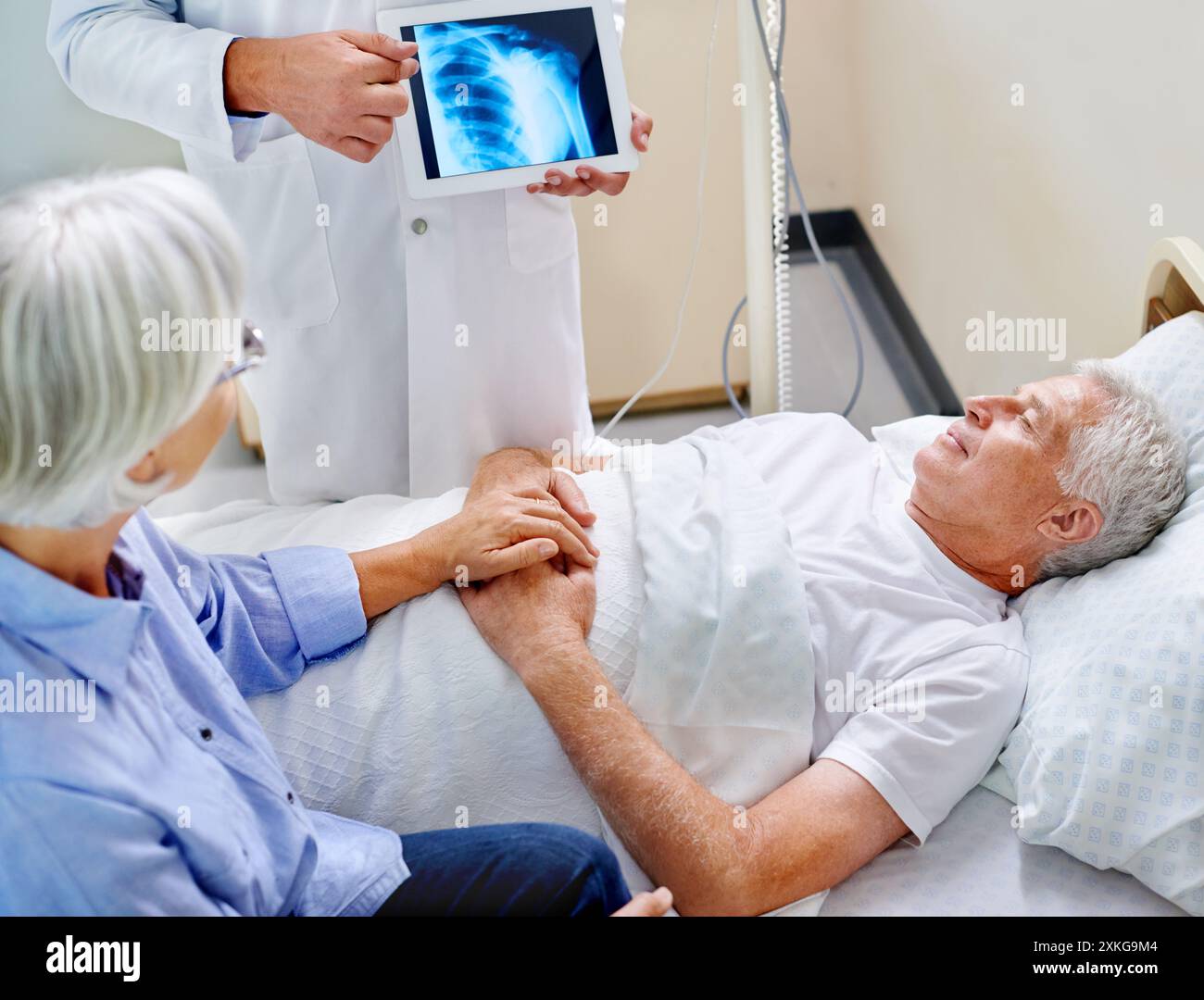 Doctor, senior and patient with xray on tablet for consultation with ... Doctor, senior and patient with xray on tablet for consultation with ...