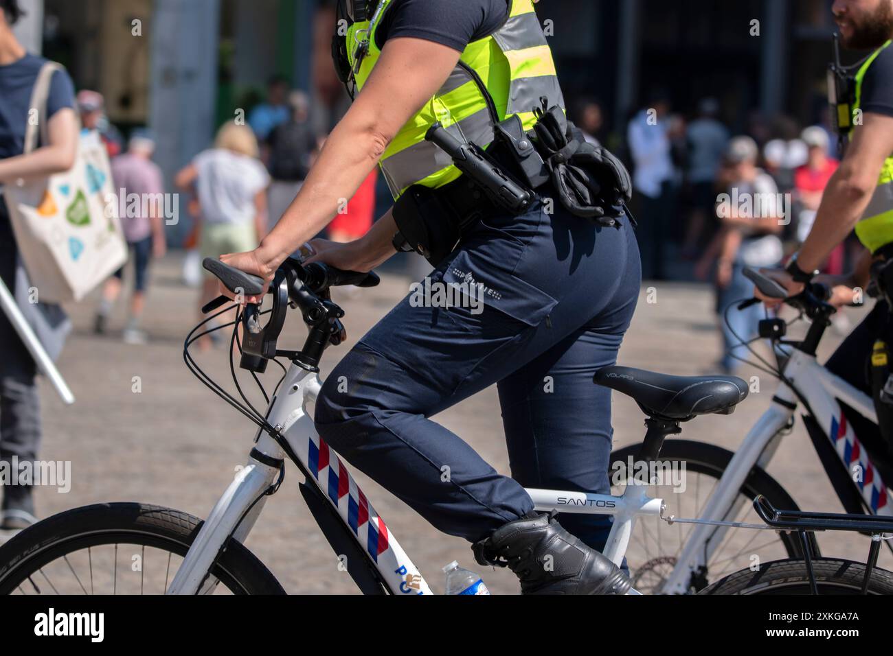 Close Up Police On Bicycle At Amsterdam The Netherlands 20-7-2024 Stock ...