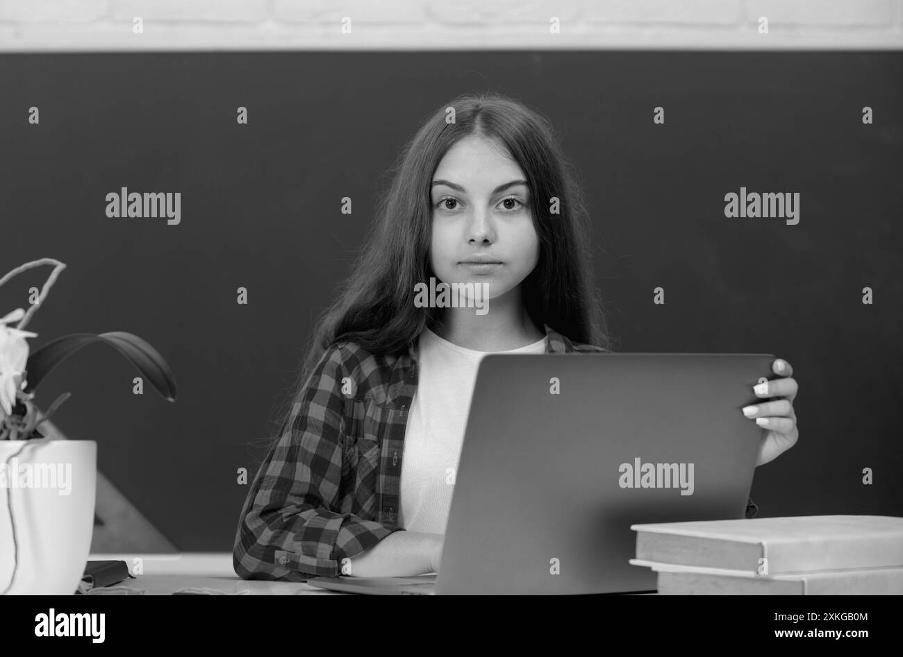 Teen girl school student with laptop at school. Teenager Student ...