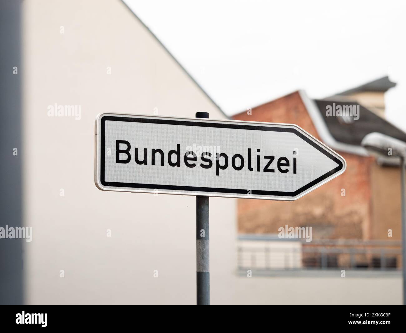 Bundespolizei (federal police) sign in Germany guiding to the right ...
