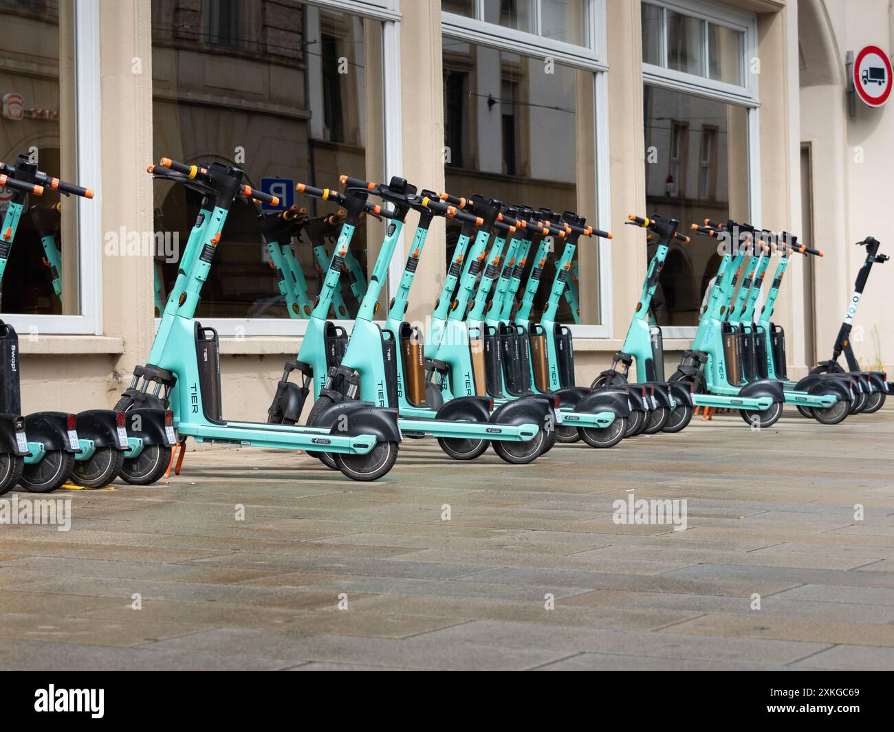 TIER scooter standing in the inner city on the sidewalk in the ...