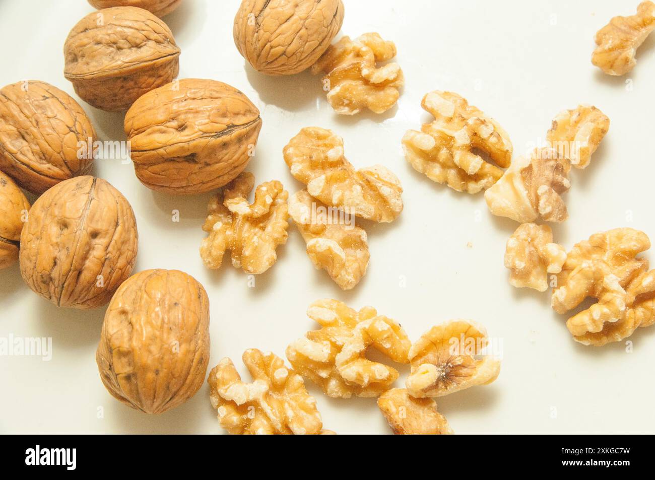 walnuts with and without shell, on white background Stock Photo - Alamy