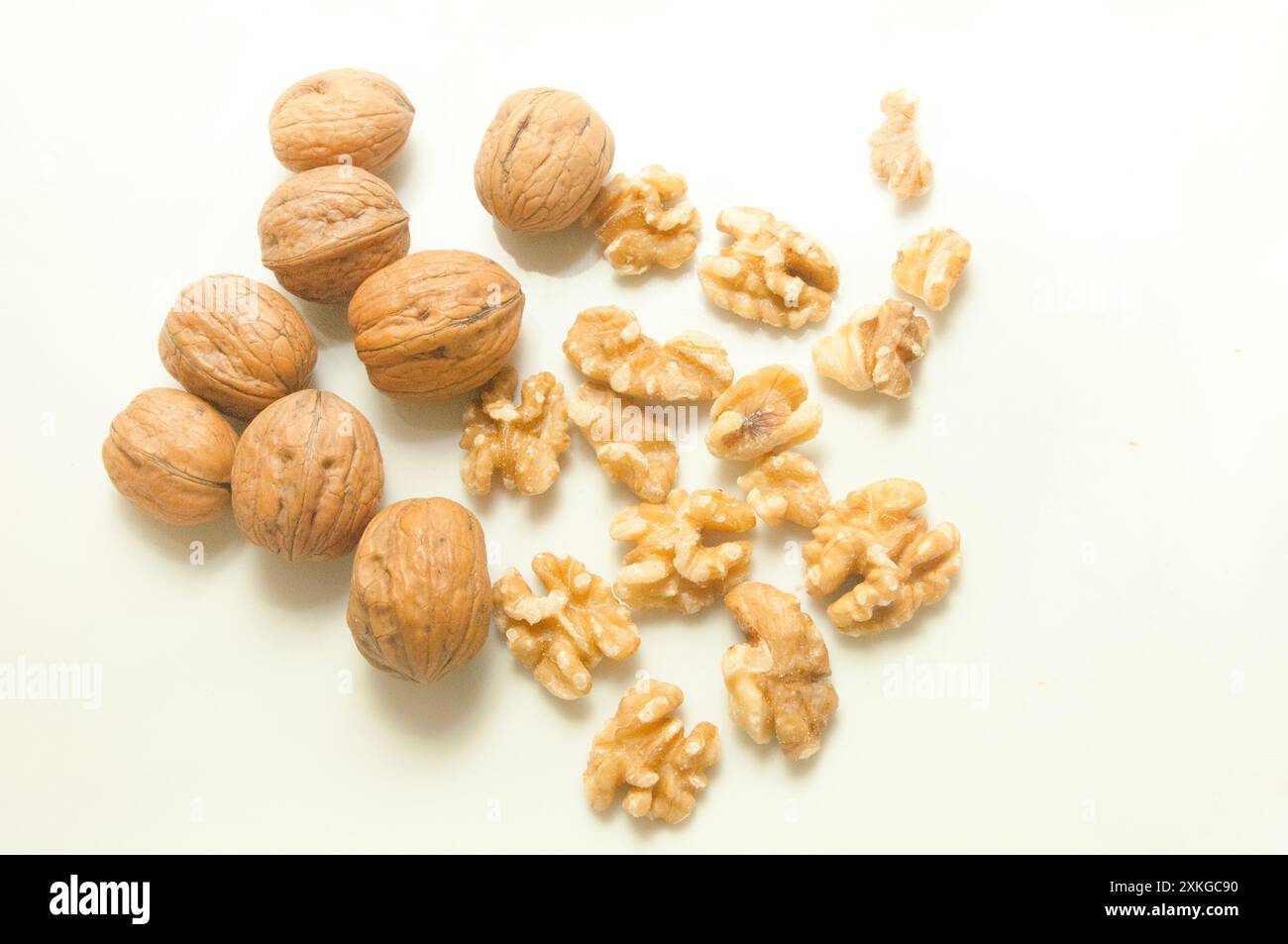 walnuts with and without shell, on white background Stock Photo - Alamy