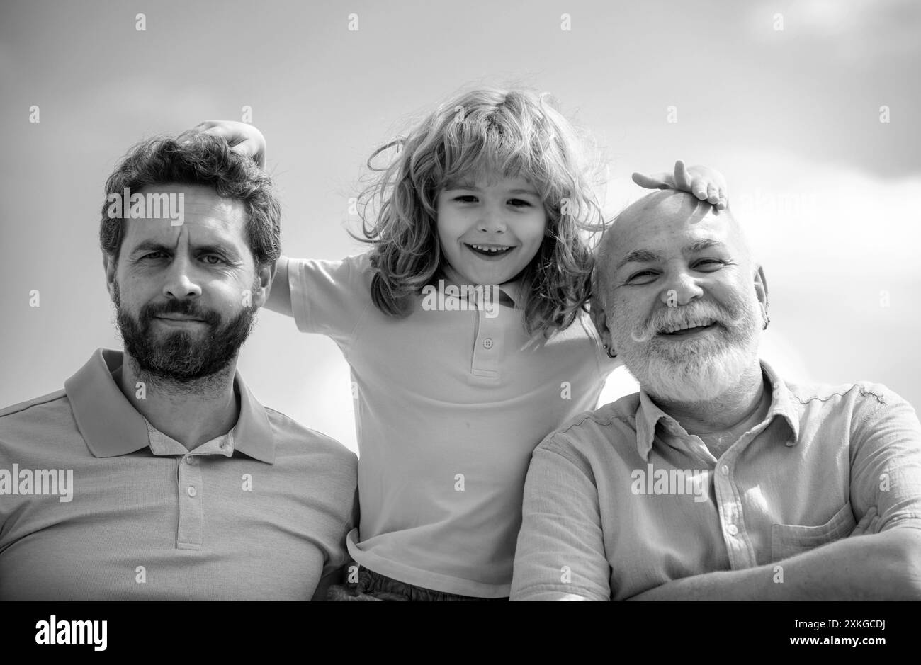 Men generation portrait of grandfather father and funny son child ...