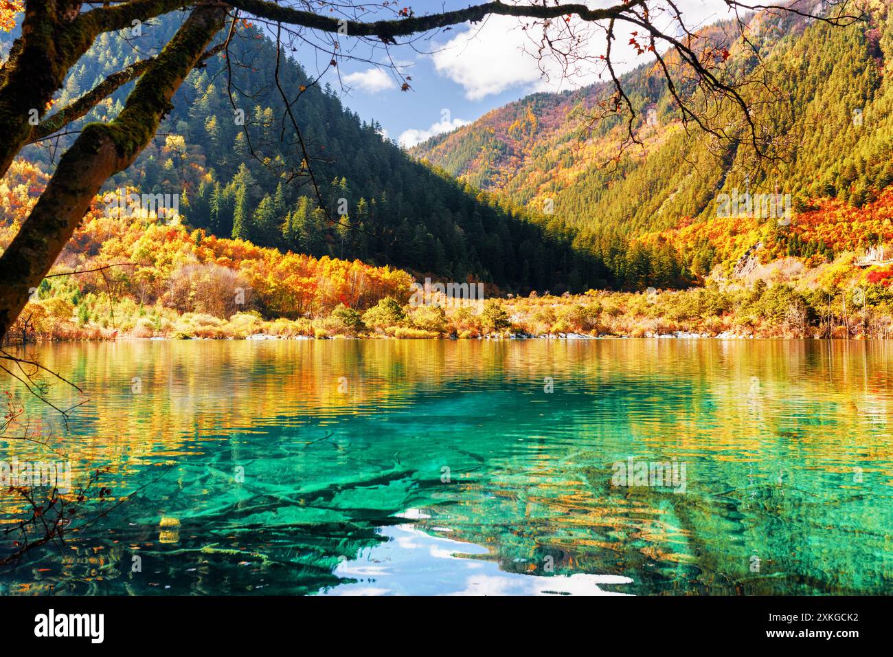 Azure water of lake among fall woods in the Shuzheng Valley Stock Photo ...