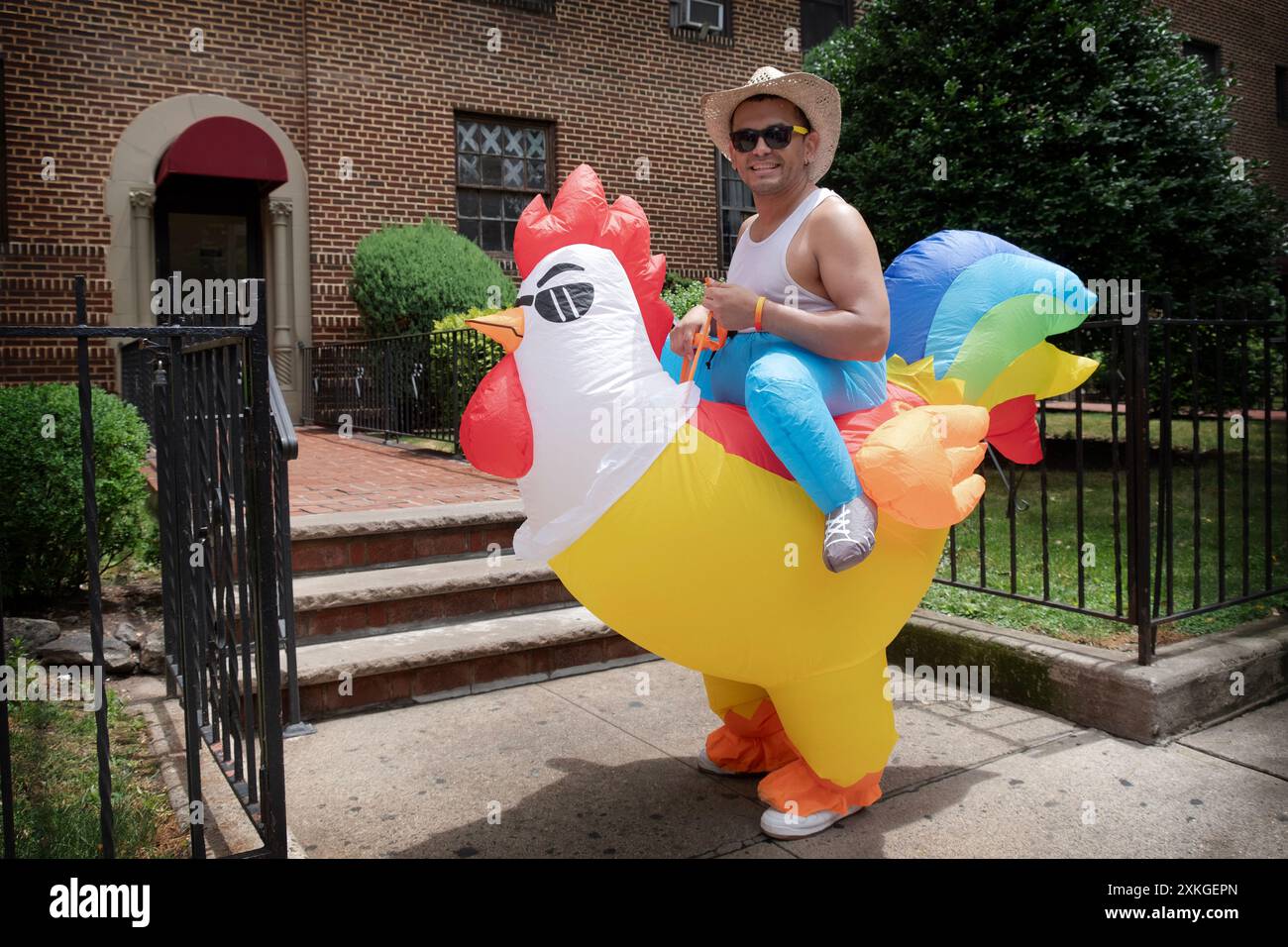 OPTICAL ILLUSION, A man appearing to be riding on a large inflated ...