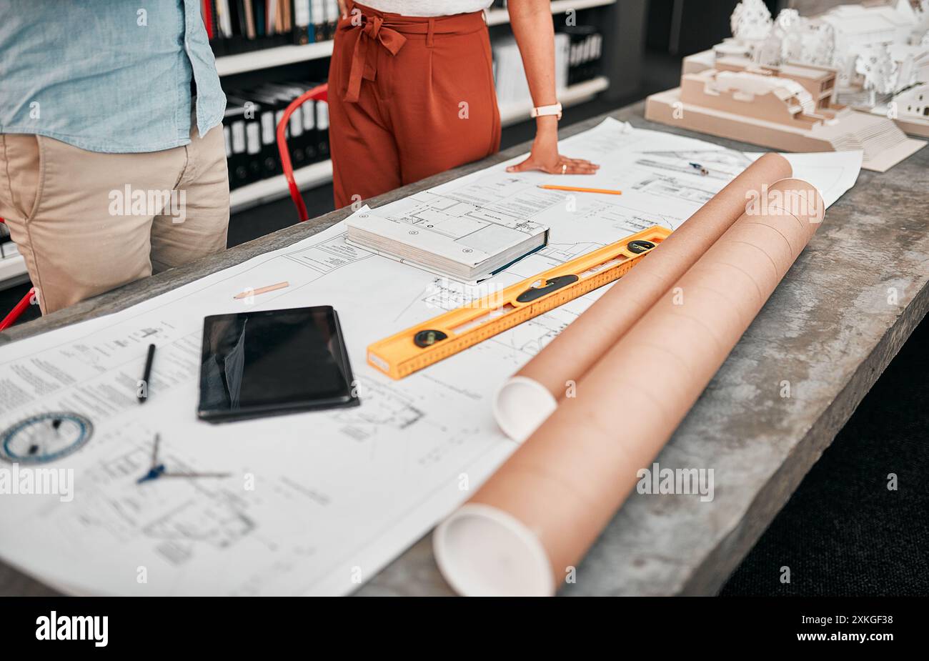 Architecture, teamwork and hands with blueprint in office for creativity, project and planning ...