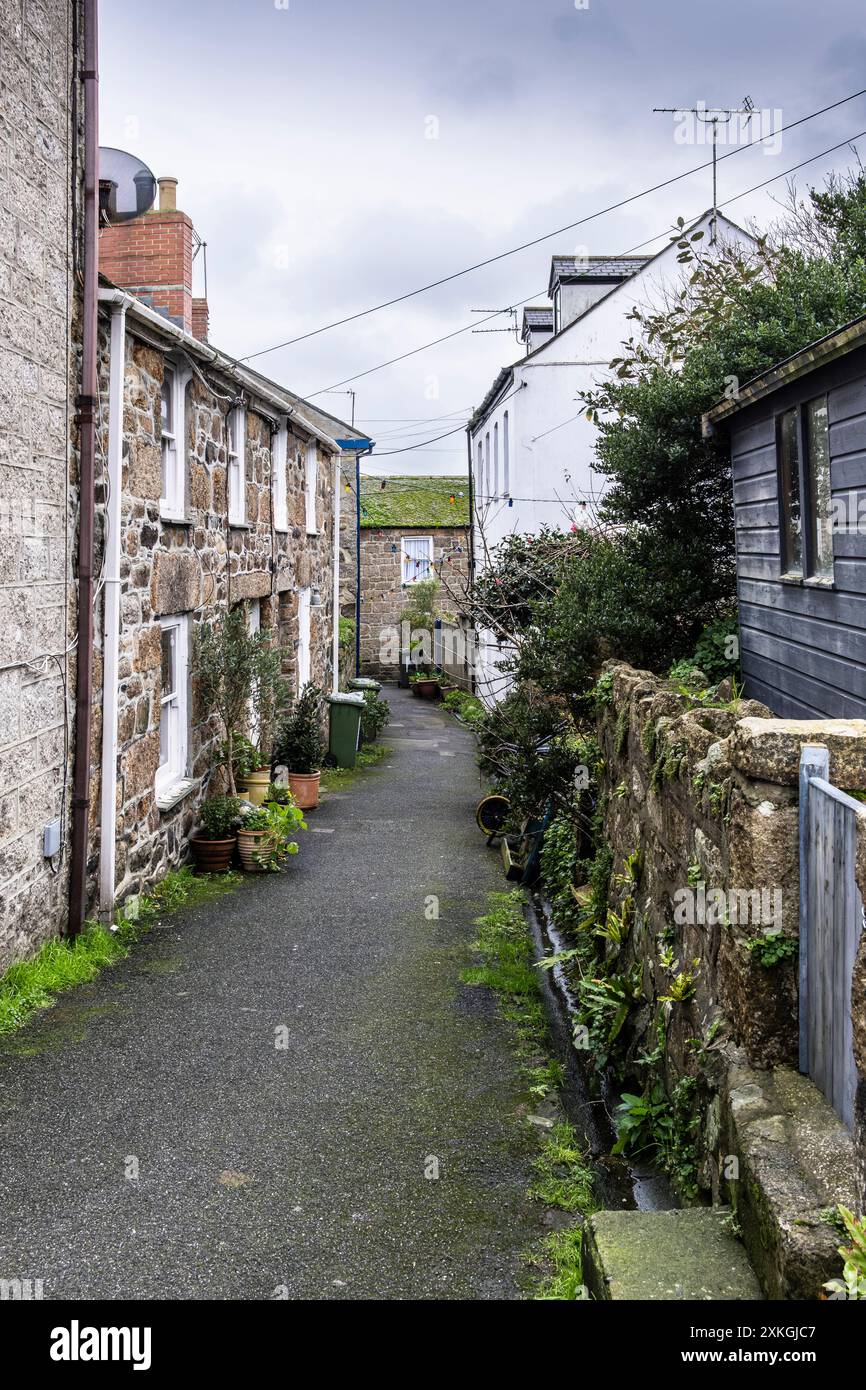 The quaint Duck Street in the coastal village of Mousehole in Cornwall ...
