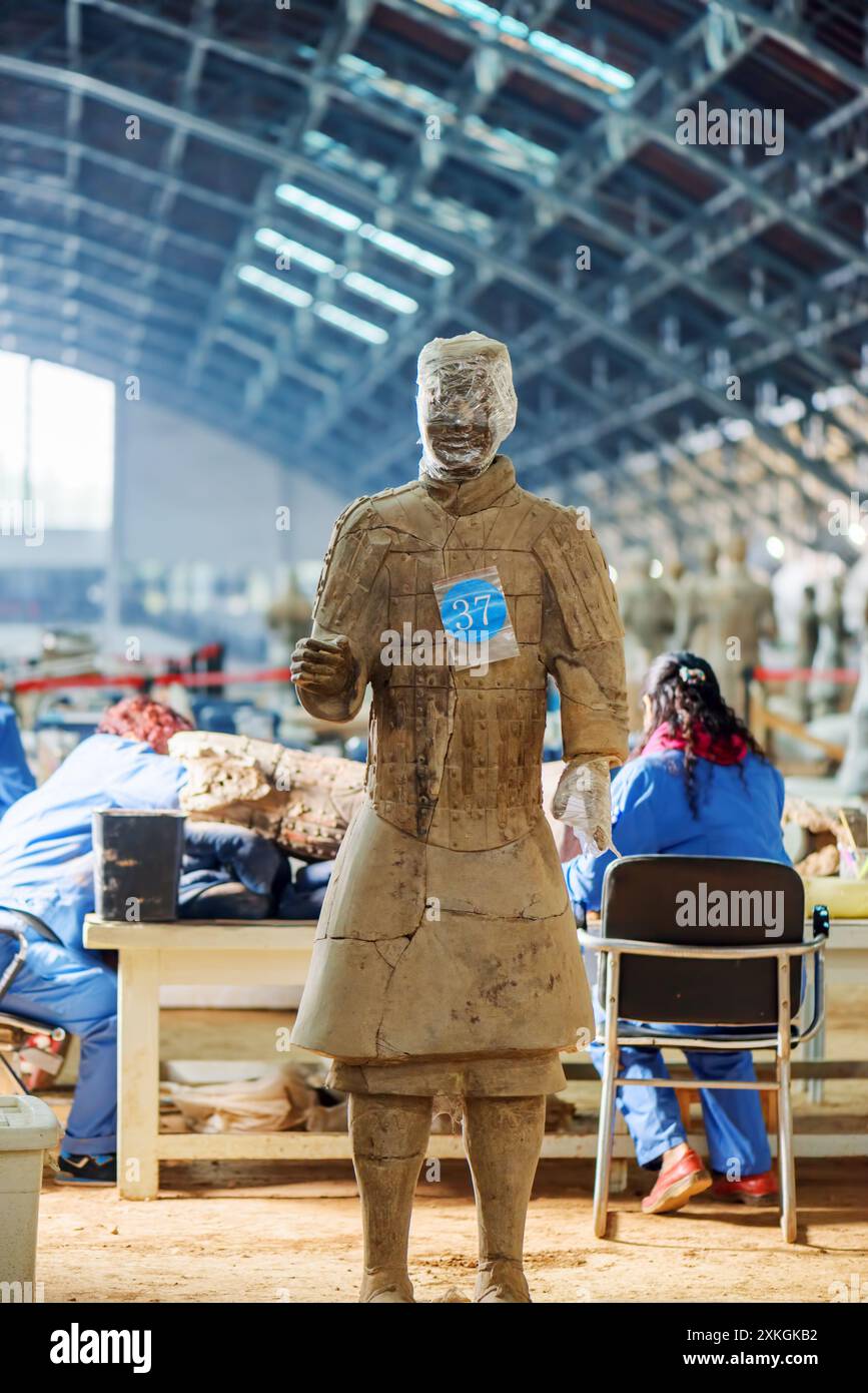Chinese archaeologists at excavation site of the Terracotta Army Stock ...