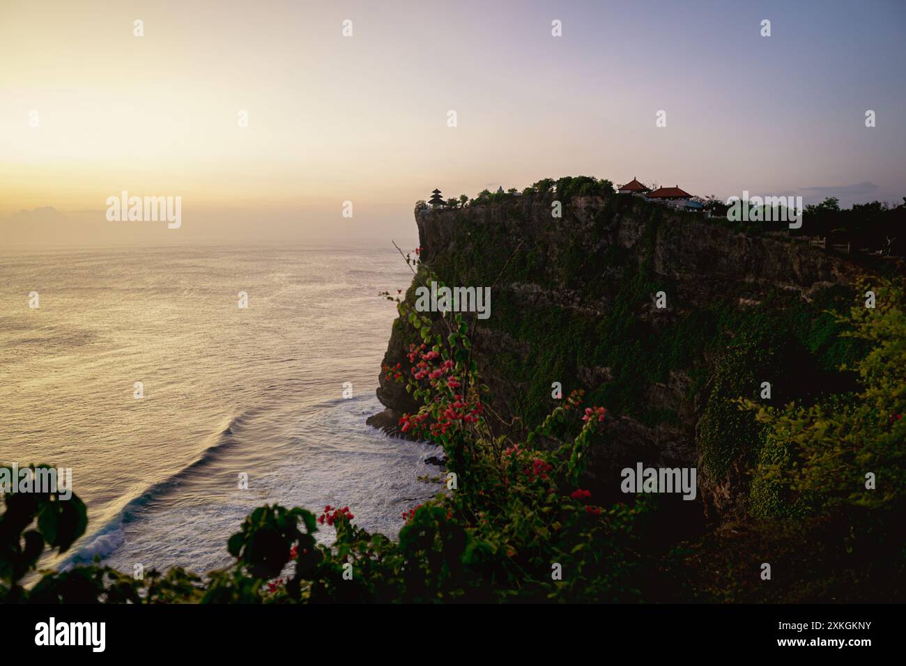 Sunset Over Uluwatu Temple on the Cliffside, Bali, Indonesia Stock ...