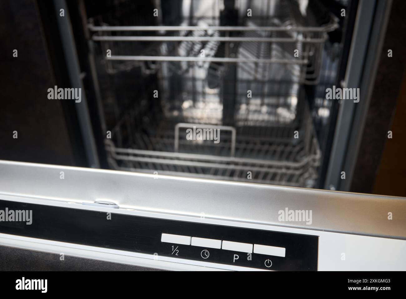 Dishwasher control panel closeup. Mode program timer knobs on control ...