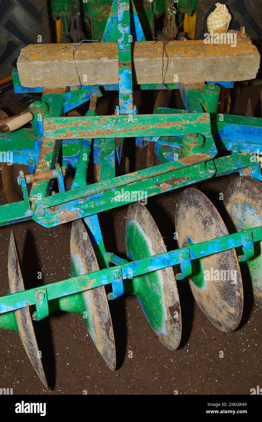 Detailed image of a plough, showing the natural wear of farm equipment ...