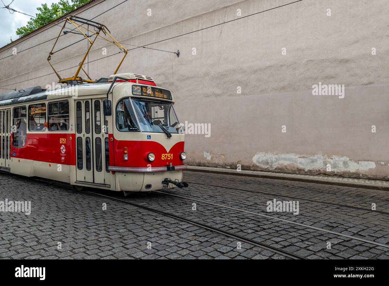Red vintage retro tram, public transportation in the streets of Prague ...