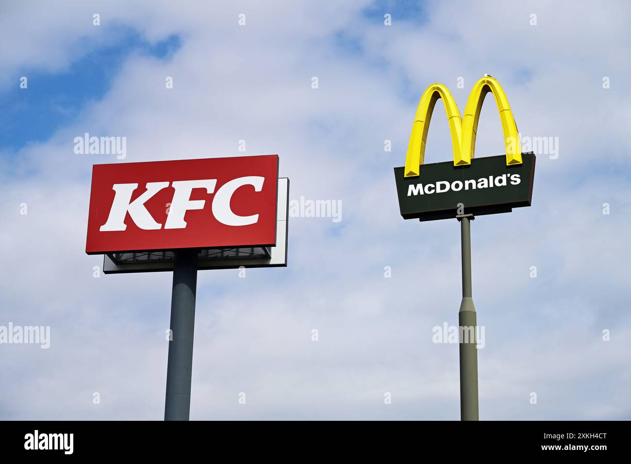 Advertising column of KFC and Mc Donalds Stock Photo - Alamy